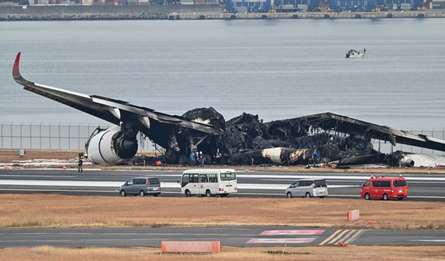 Plane wreckage being cleared from Tokyo airport after collision | News