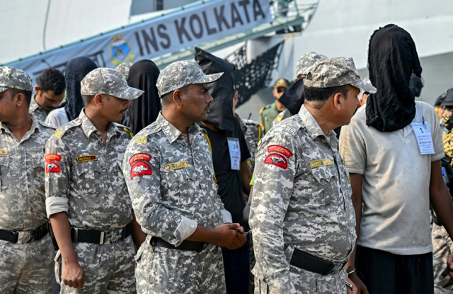 35 Somalis arrive in India to face trial over ship hijacking | News