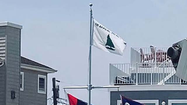 Second provocative flag flown at US justice's home: NY Times | News